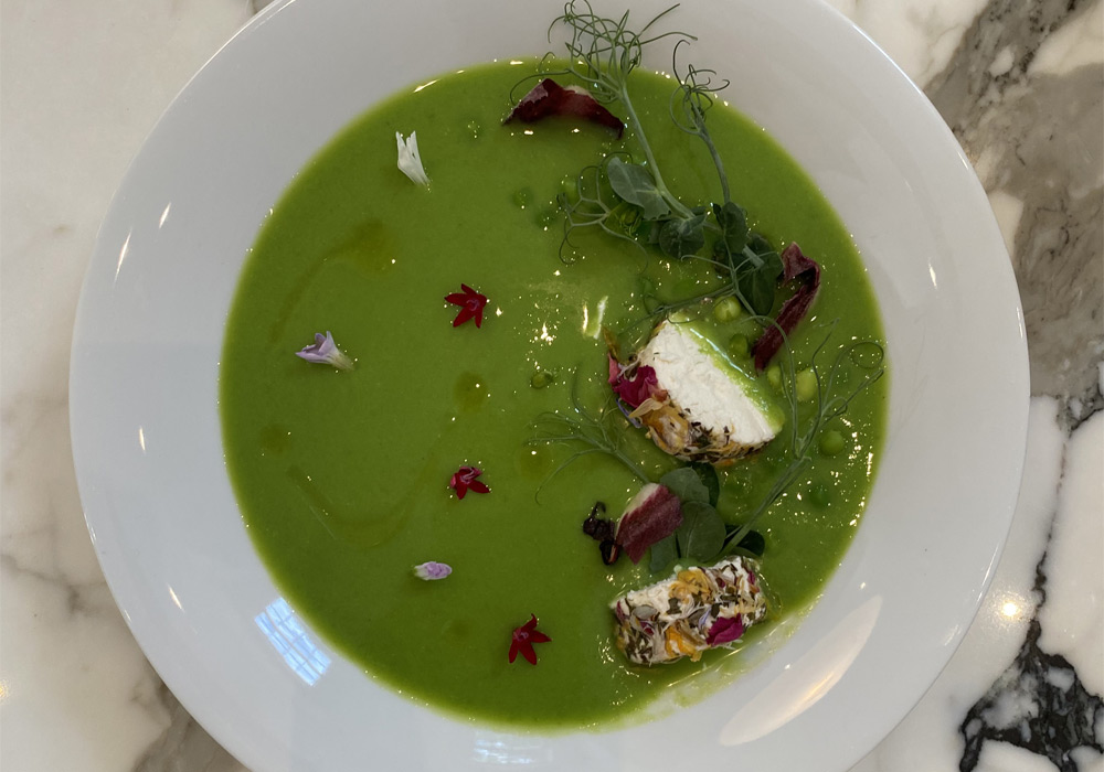 Chilled Pea Velouté with Goat Cheese & Borage Flowers - '74Escape